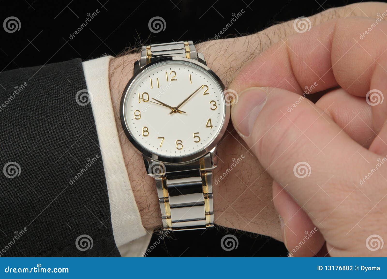 Wristwatch on a Hand of Businessman Stock Photo - Image of suit, close ...