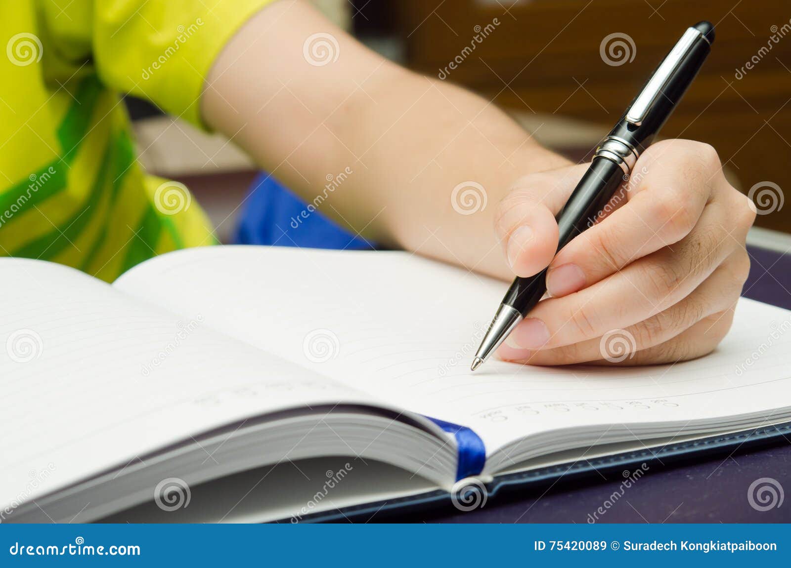 Write Activity with a Pen and a Book Stock Image - Image of holding ...