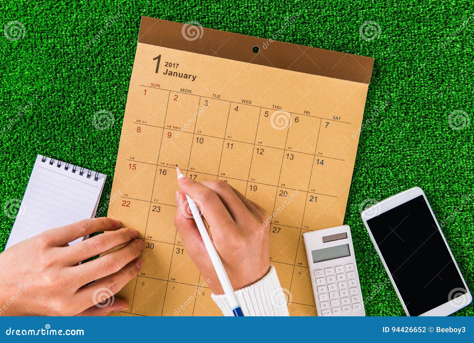 Write a Schedule To a Calendar Placed on a Table Stock Photo - Image of ...