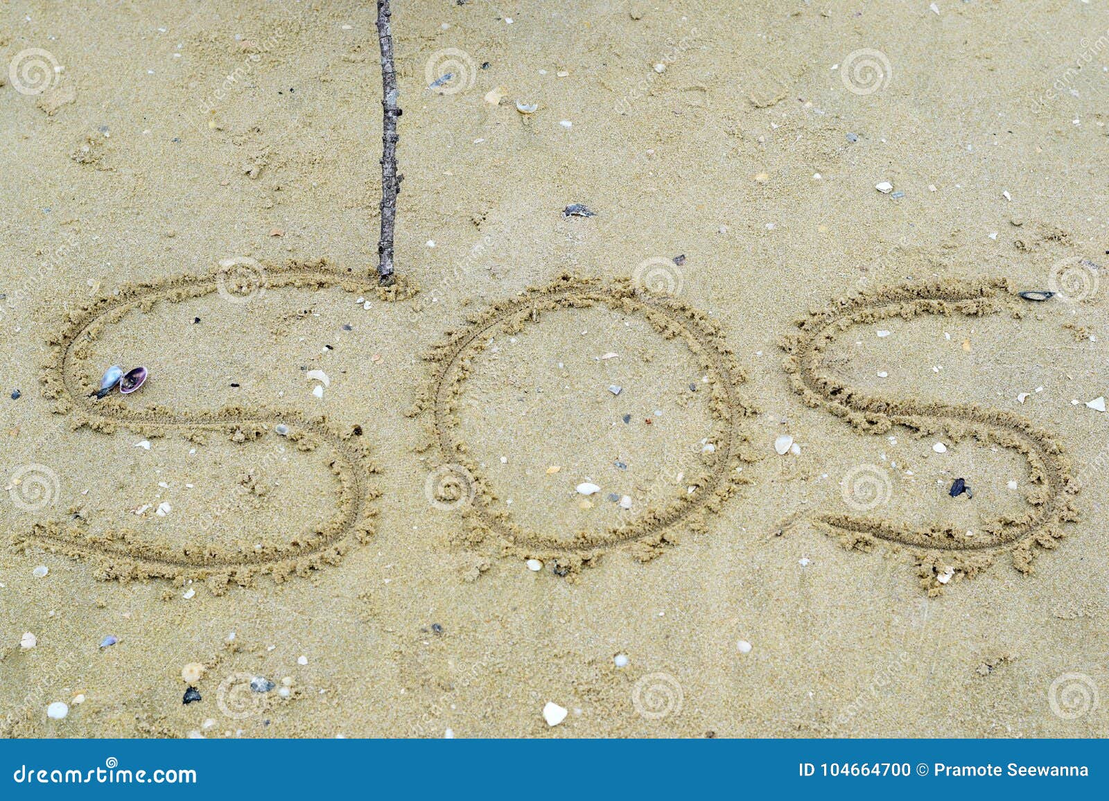 Write A Symbol For Help On The Sand. SOS Symbol On The Sand. Stock ...