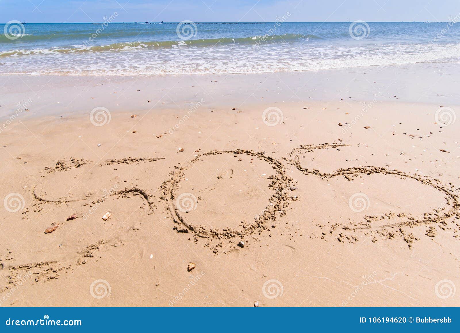 Write a Symbol for Help on the Sand. SOS Symbol on the Sand. Stock ...