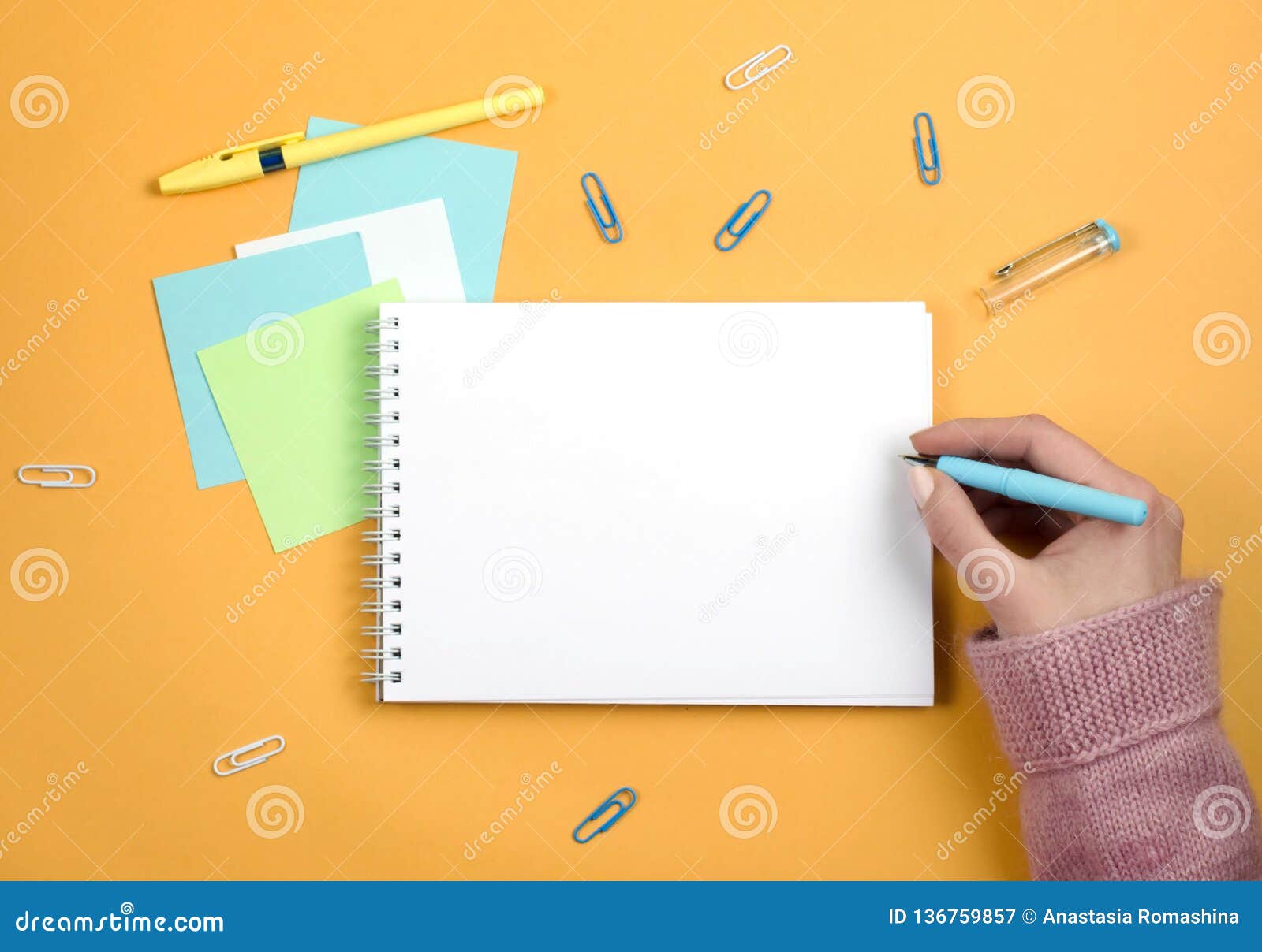 Write Thoughts and Ideas in a Clean White Notebook on an Orange ...