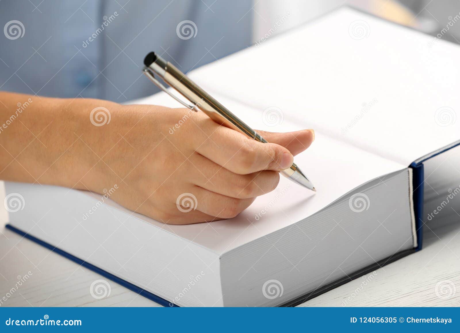 Writer Signing Autograph in Book at Table Stock Image - Image of adult ...