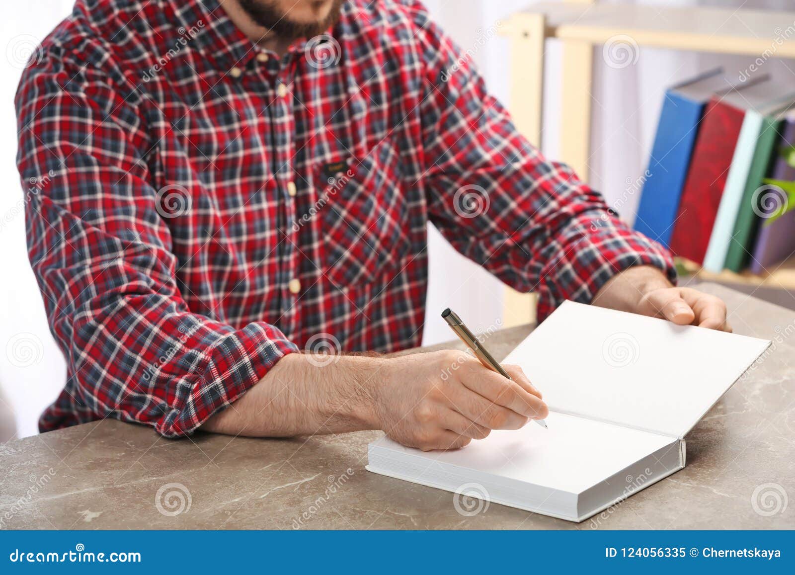 Writer Signing Autograph in Book at Table Stock Image - Image of paper ...