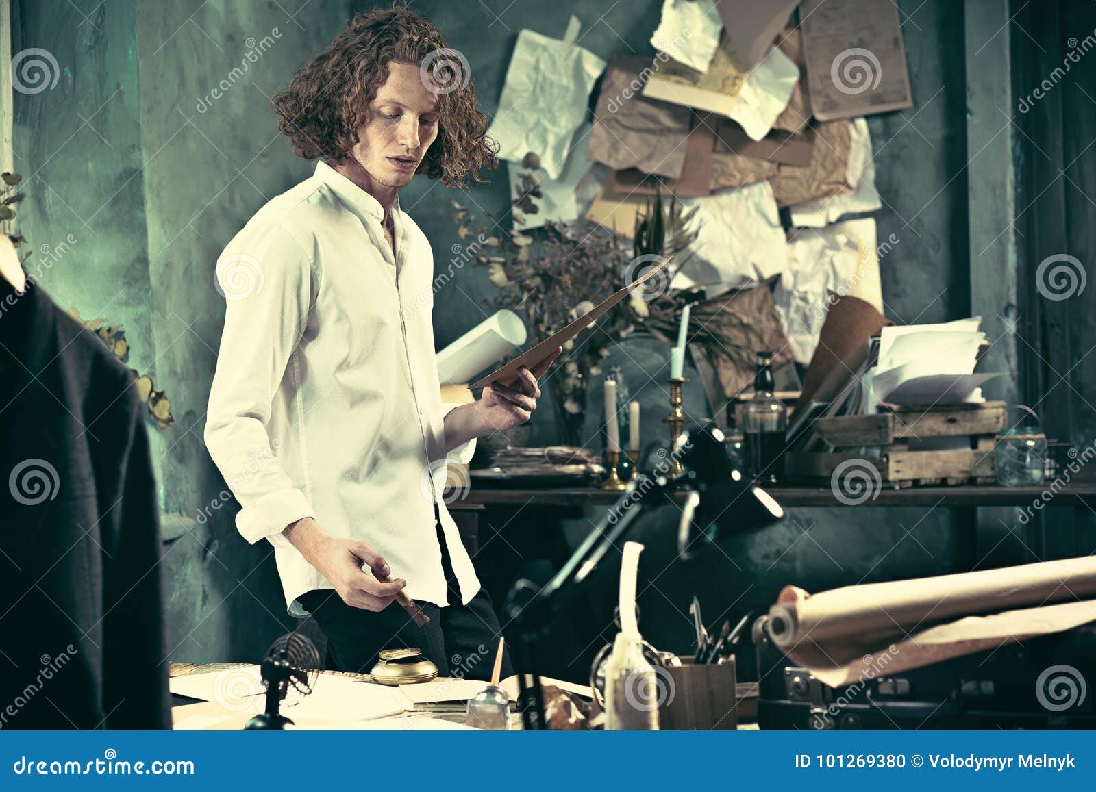 Writer at Work. Handsome Young Writer Standing Near the Table and ...