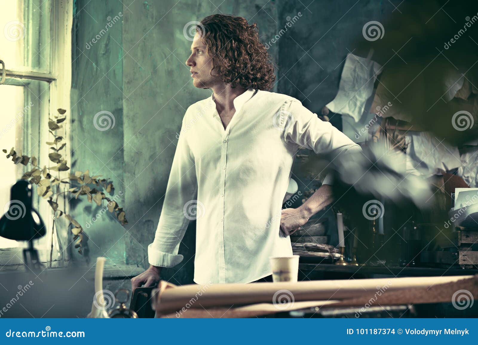 Writer at Work. Handsome Young Writer Standing Near the Table and ...