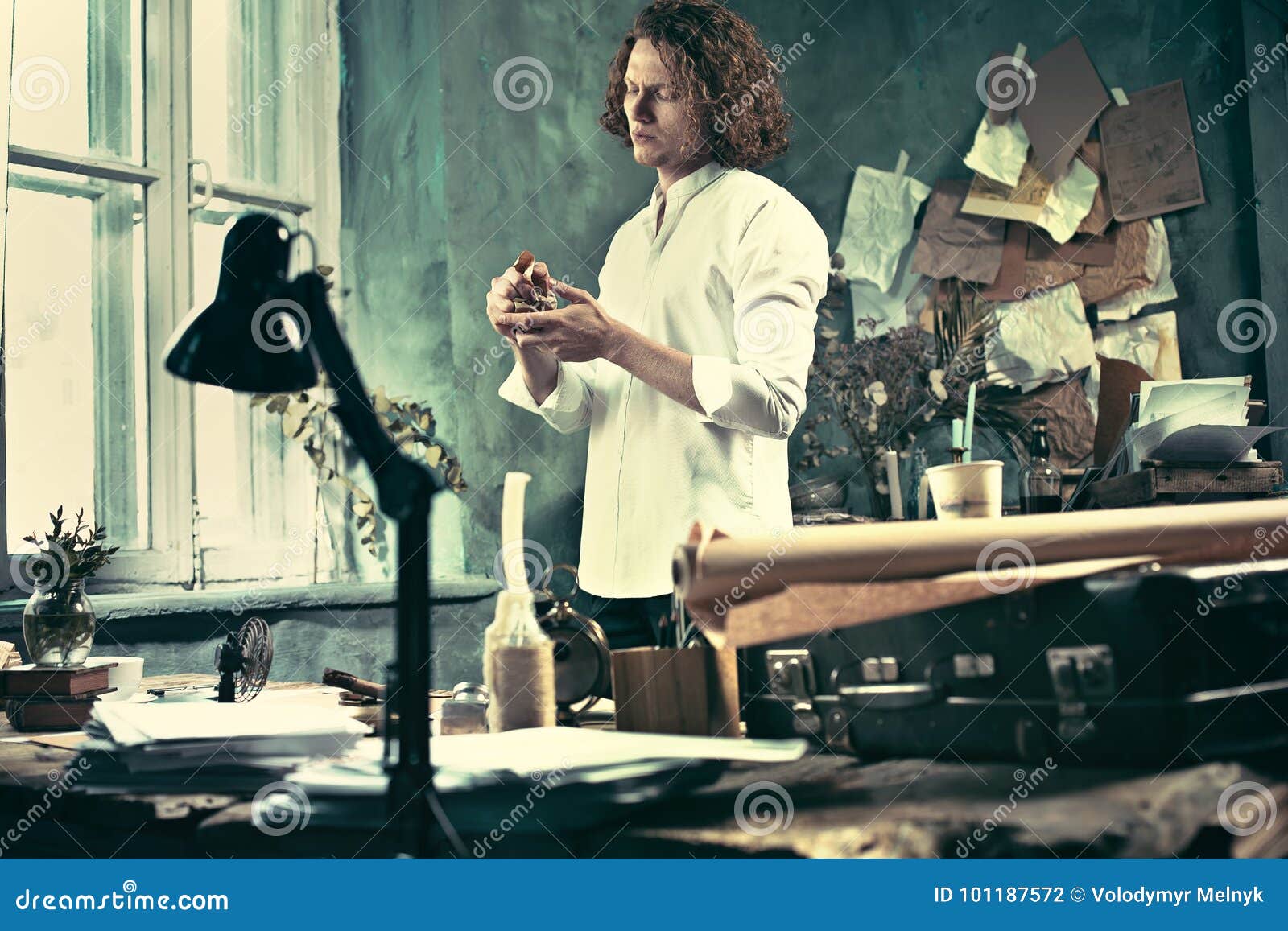 Writer at Work. Handsome Young Writer Standing Near the Table and ...