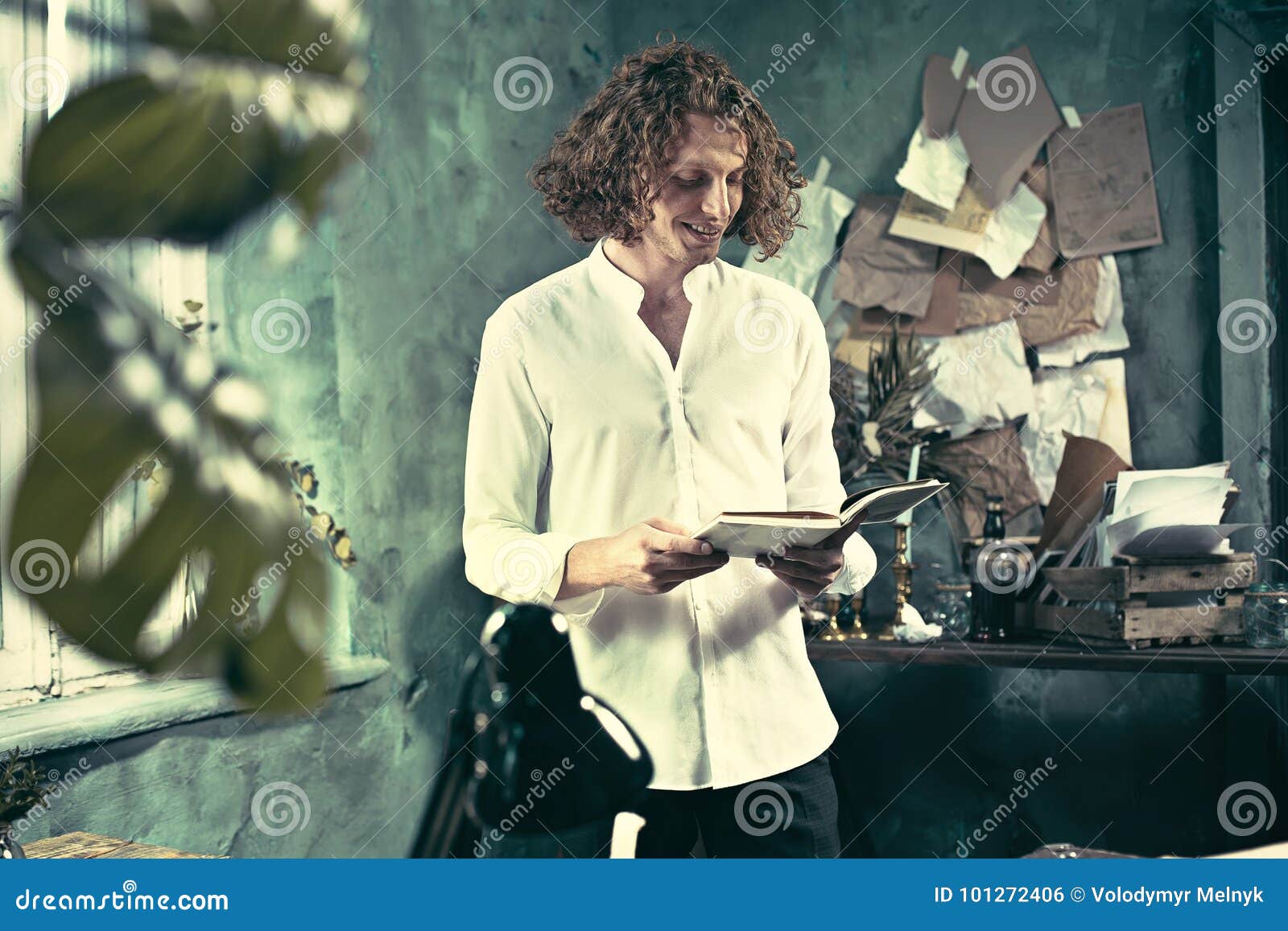 Writer at Work. Handsome Young Writer Standing Near the Table and ...
