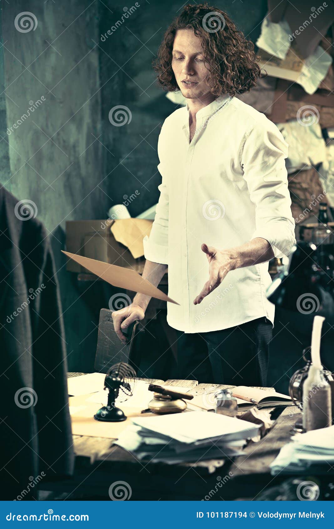 Writer at Work. Handsome Young Writer Standing Near the Table and ...