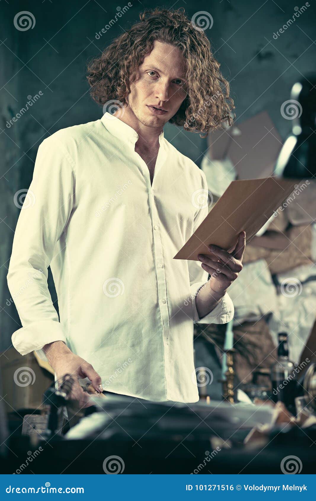 Writer at Work. Handsome Young Writer Standing Near the Table and ...