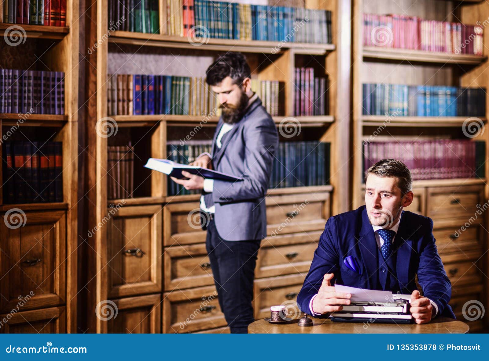 Writer or Young Author with Typewriter Search Information for Book ...