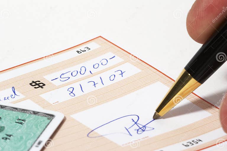 Writing a bank check stock photo. Image of cheque, hand - 1761998