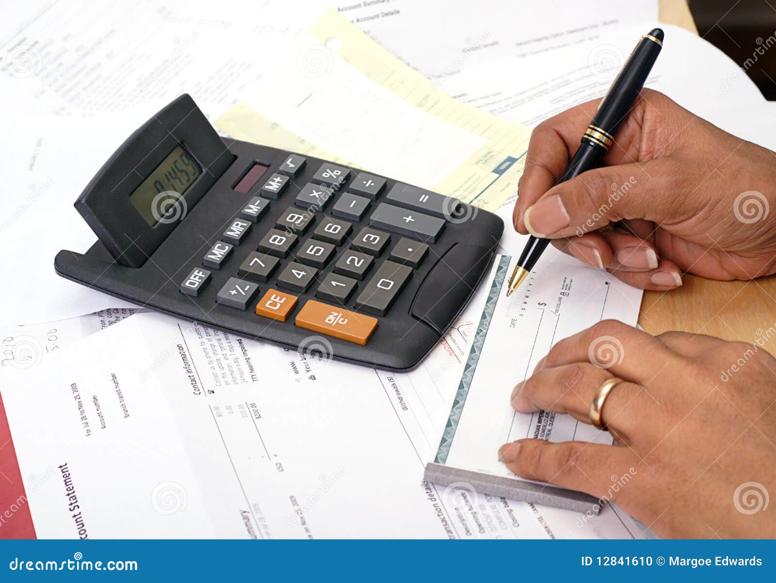 Writing A Cheque Royalty-Free Stock Image | CartoonDealer.com #26598100