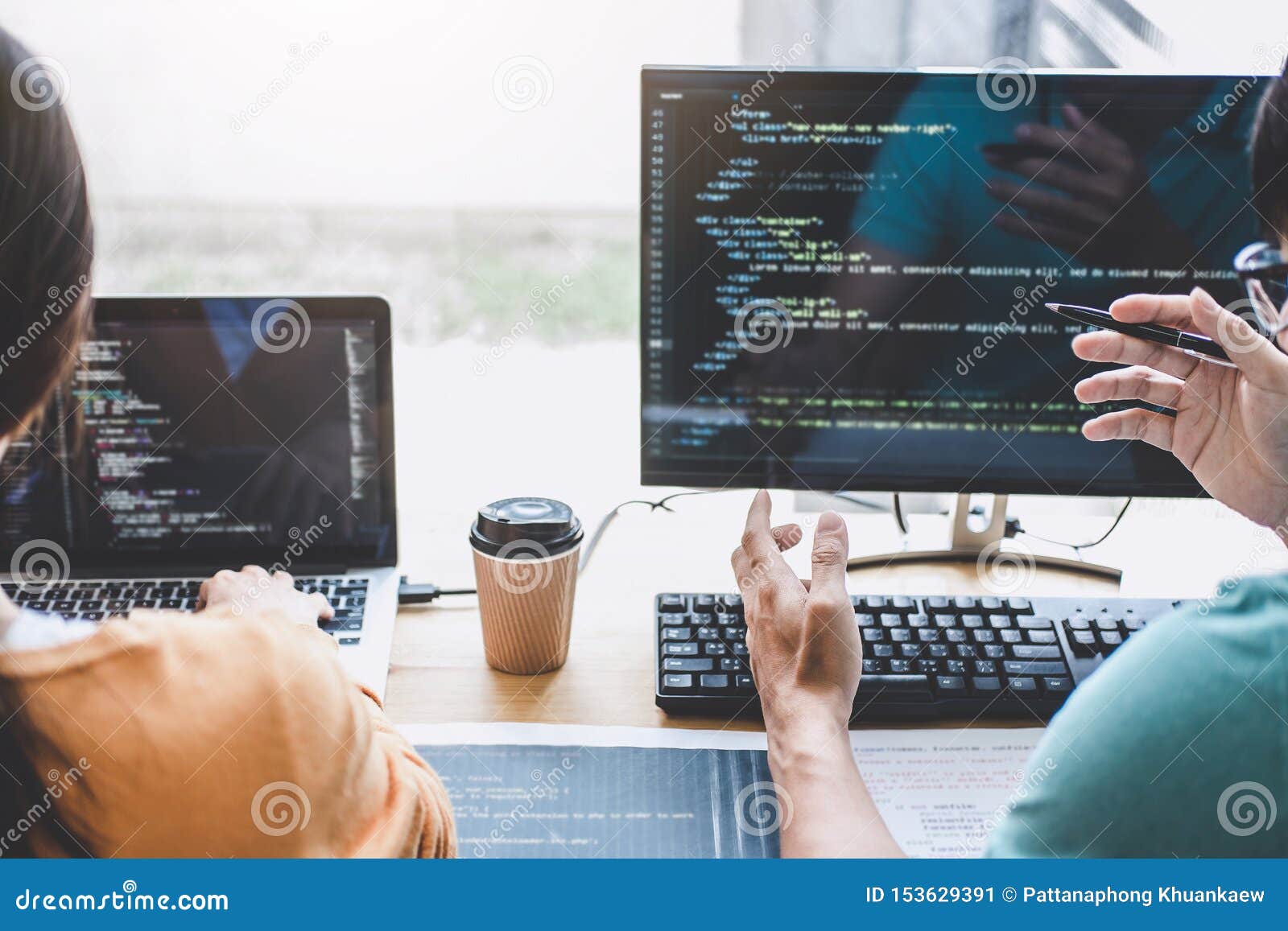 Writing Codes And Typing Data Code Technology Programmer Cooperating Working On Web Site