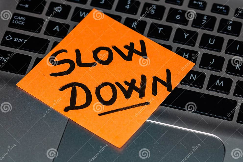 Writing on Colorful Sticky Note Slow Down. Text with Slow Down on Paper ...