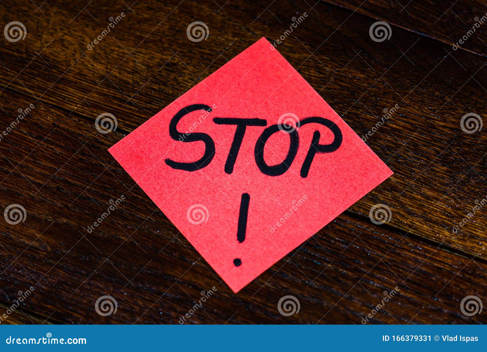 Writing on Colorful Sticky Note STOP. Text with Stop on Paper Stock ...