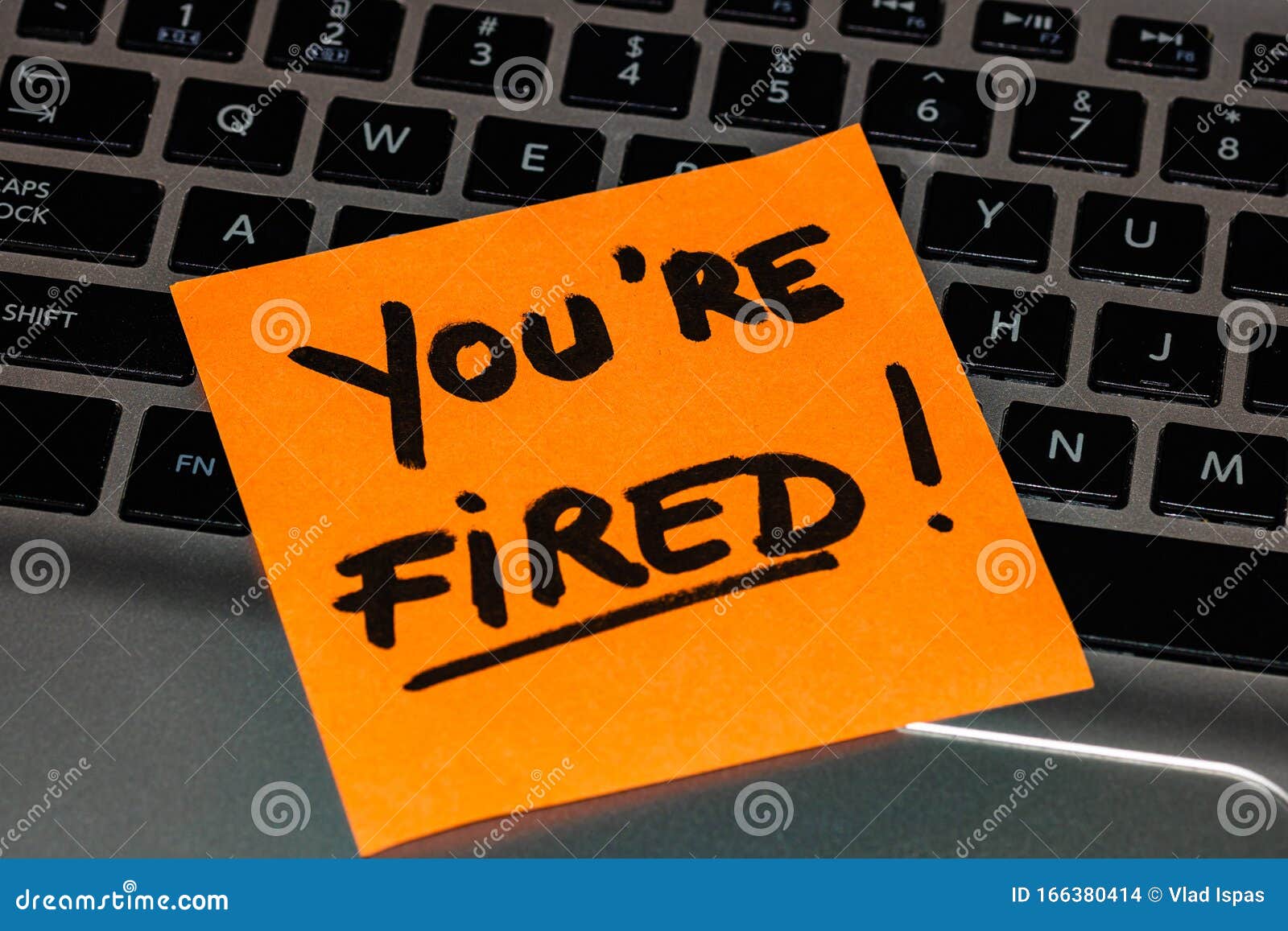 Writing on Colorful Sticky Note You are Fired. Text with You are Fired ...