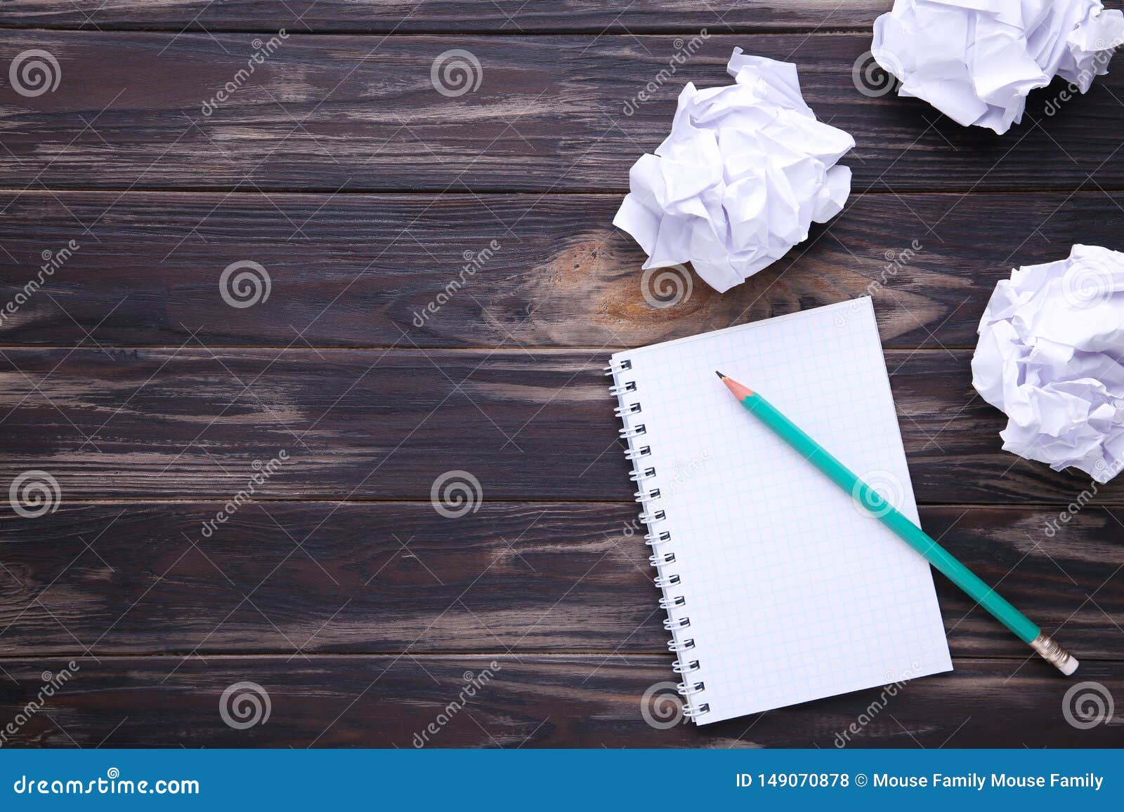 Writing Concept - Crumpled Up Paper Wads with a Sheet of Paper and ...