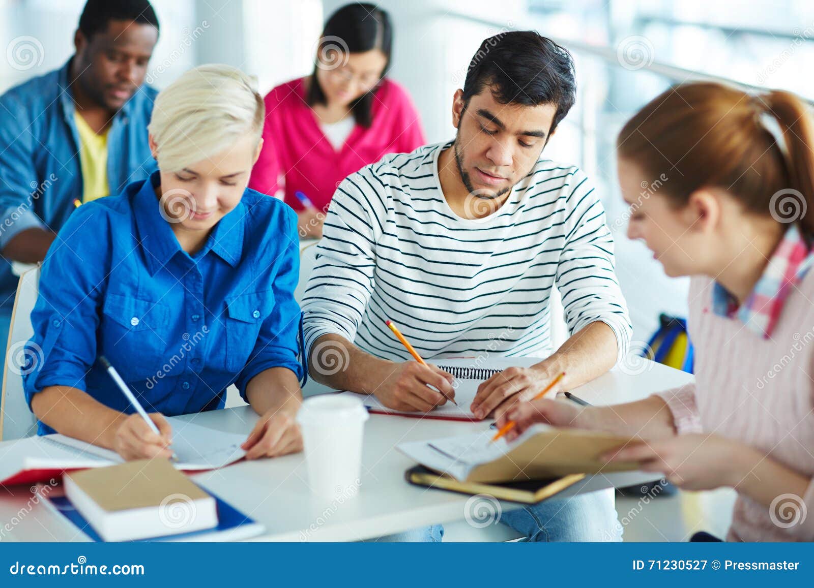 Writing Down Home Assignment Stock Image - Image of student, groupmate ...