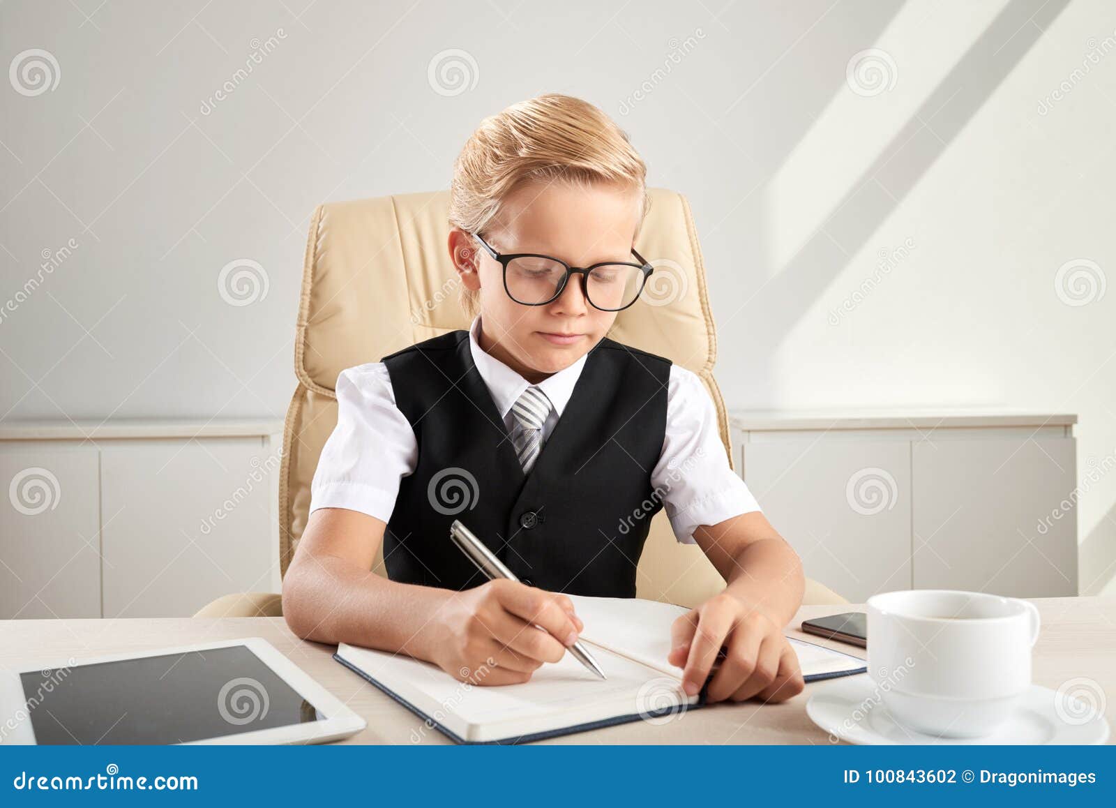 Writing down ideas stock photo. Image of schoolboy, business - 100843602