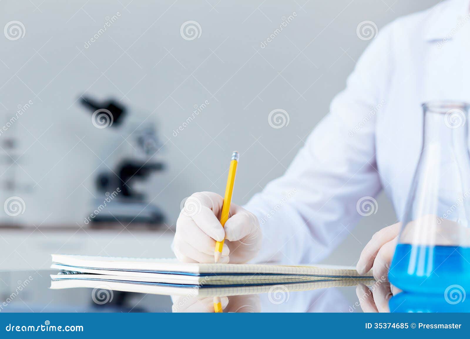 Writing down observations stock image. Image of flask - 35374685