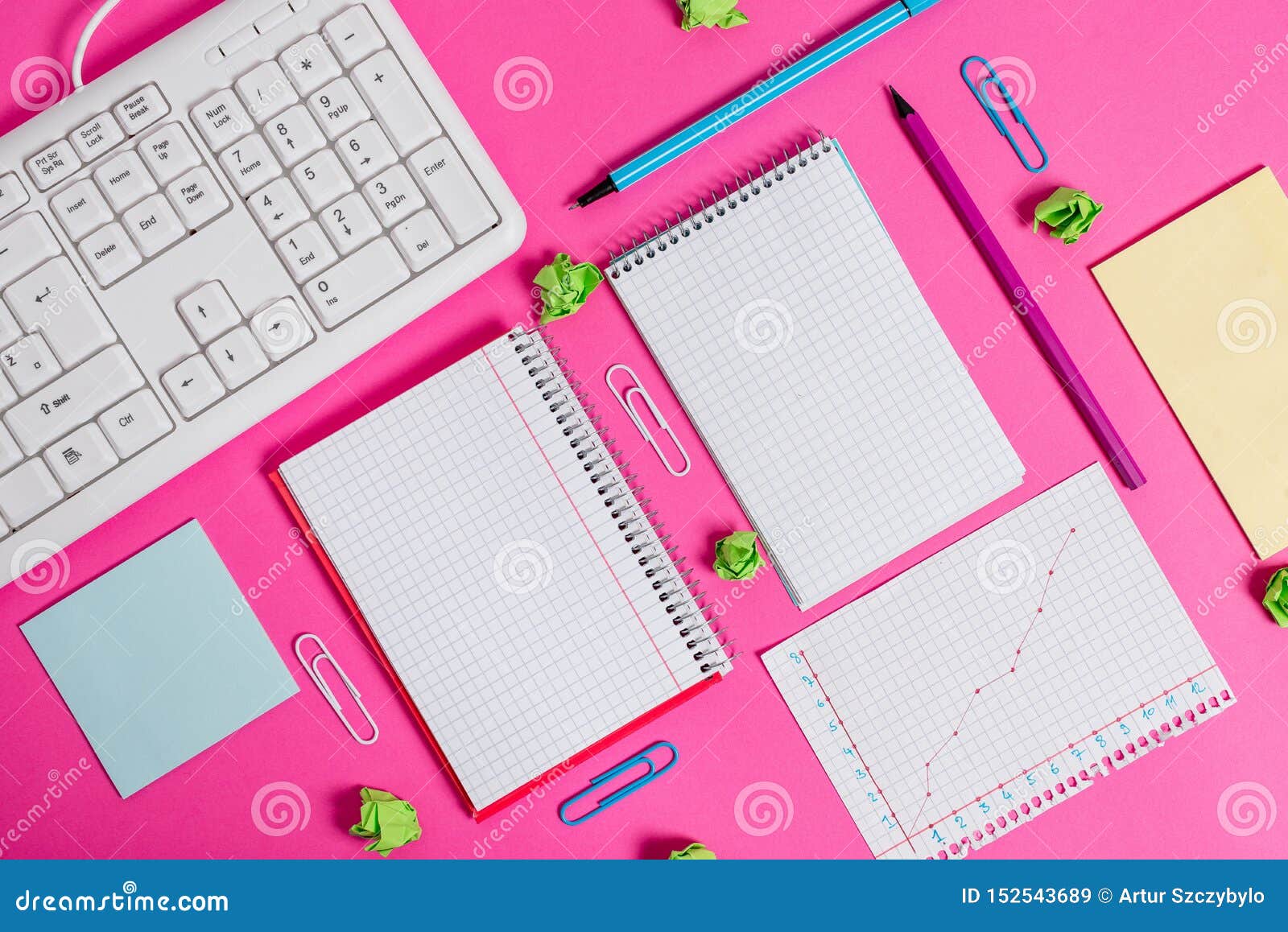 Writing Equipments and Computer Stuffs Plus Mathematic Paper Placed on ...