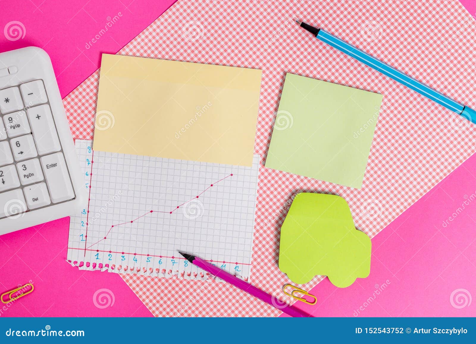 Writing Equipments and Computer Stuffs Plus Mathematic Paper Placed on ...