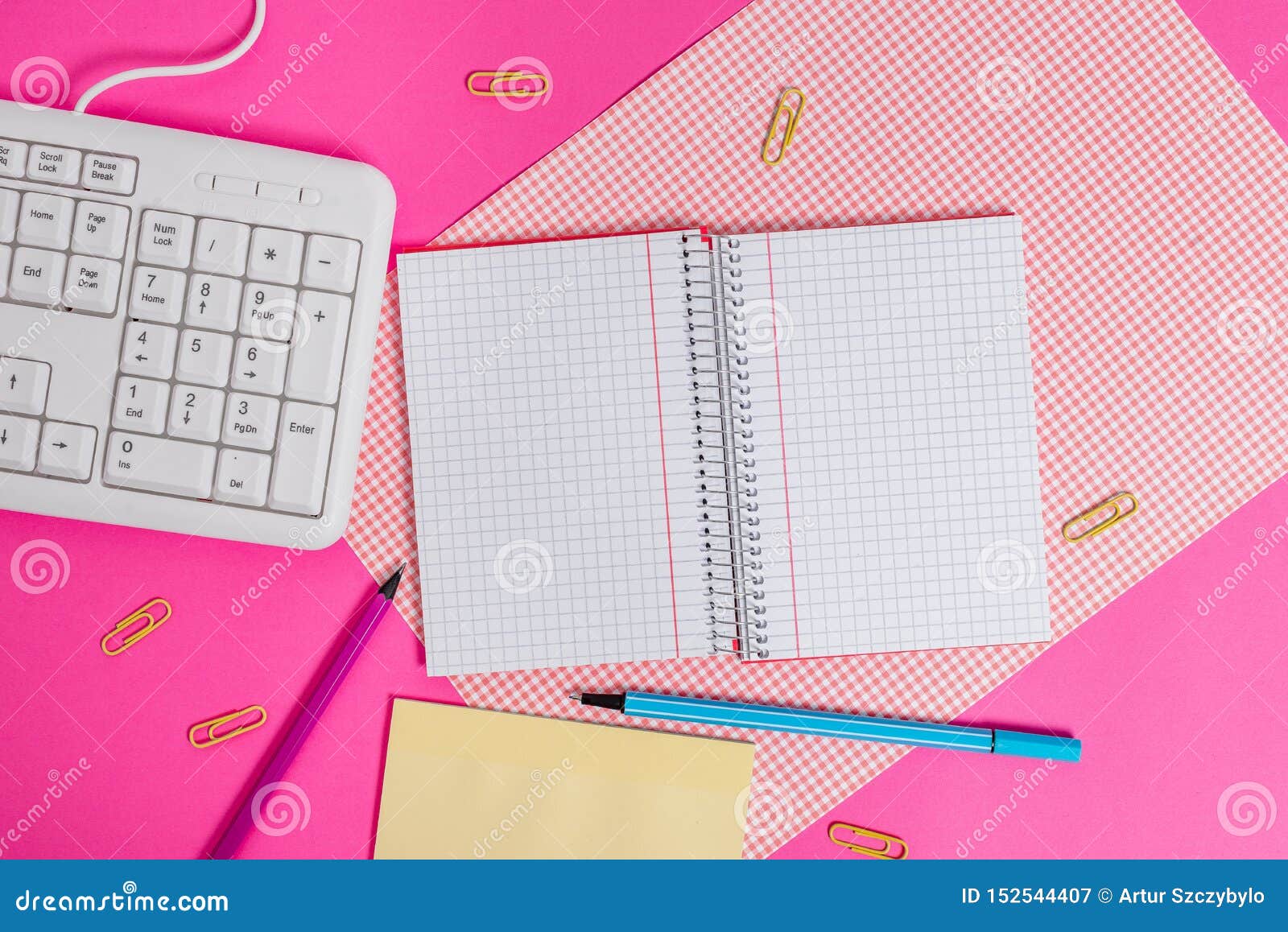 Writing Equipments and Computer Stuffs Plus Mathematic Paper Placed on ...