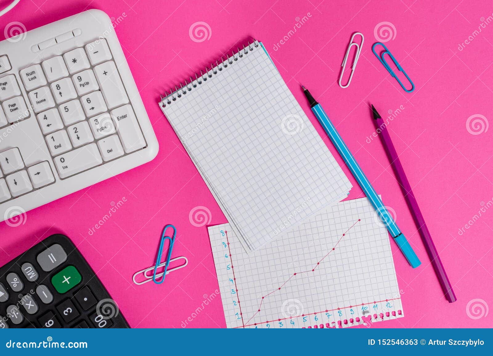 Writing Equipments and Computer Stuffs Plus Mathematic Paper Placed on ...