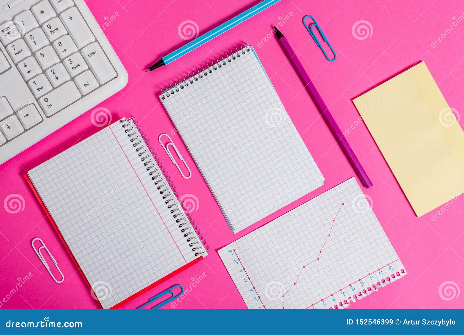 Writing Equipments and Computer Stuffs Plus Mathematic Paper Placed on ...