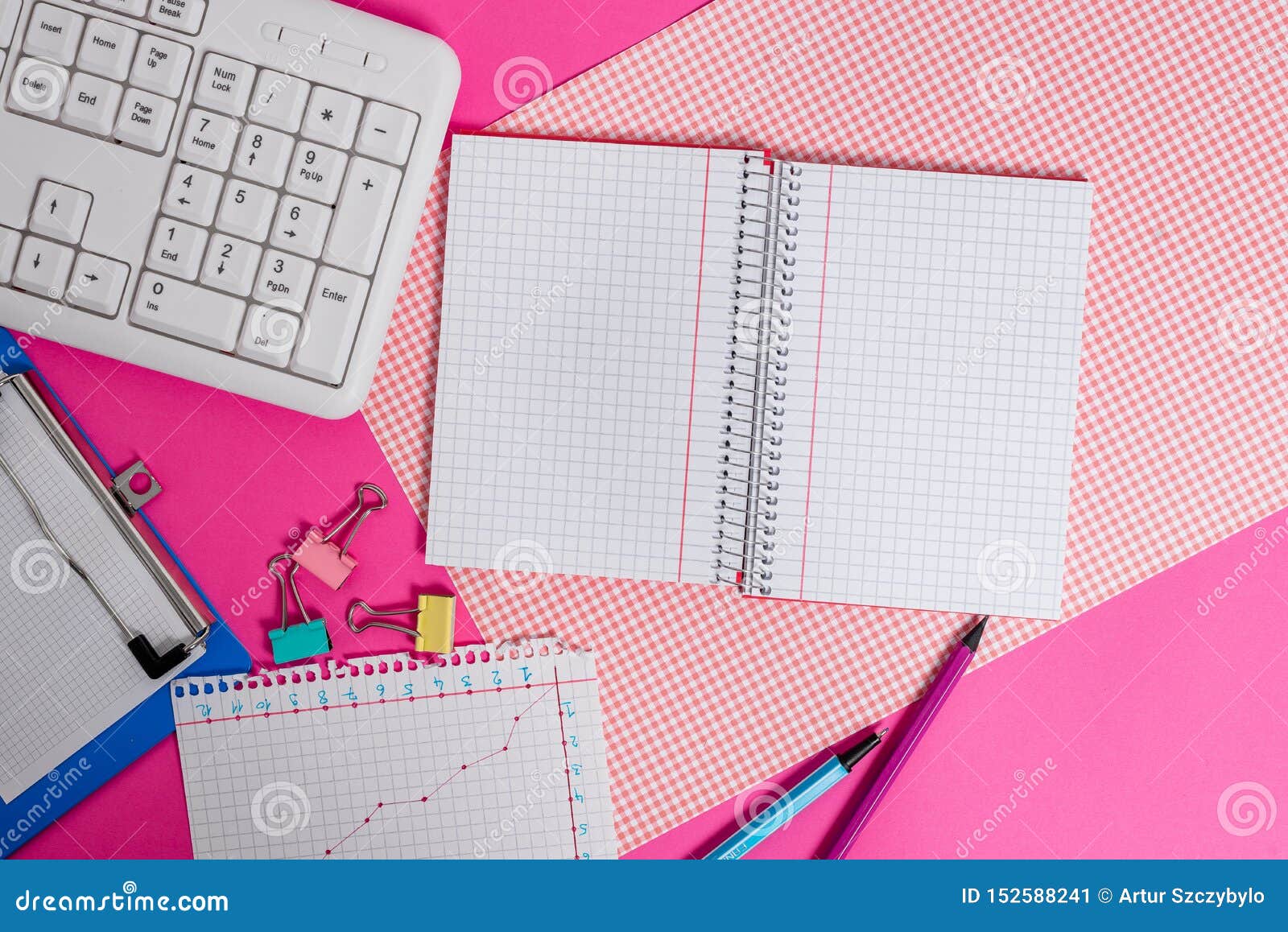 Writing Equipments and Computer Stuffs Plus Mathematic Paper Placed on ...