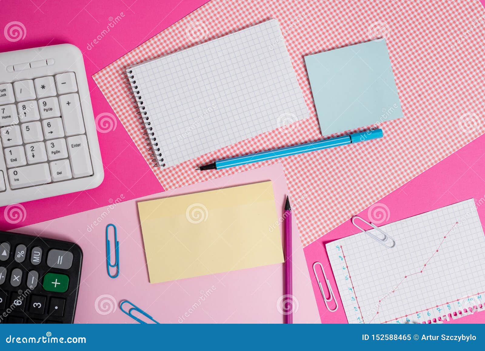 Writing Equipments and Computer Stuffs Plus Mathematic Paper Placed on ...