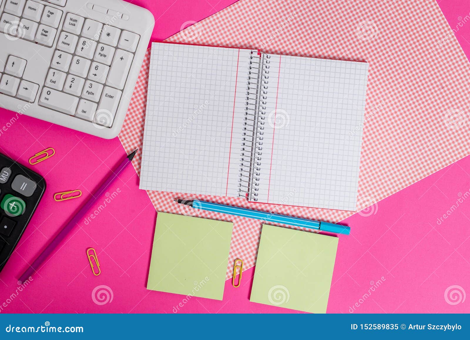 Writing Equipments and Computer Stuffs Plus Mathematic Paper Placed on ...