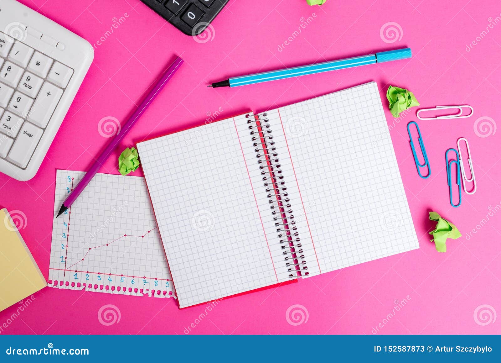 Writing Equipments and Computer Stuffs Plus Mathematic Paper Placed on ...