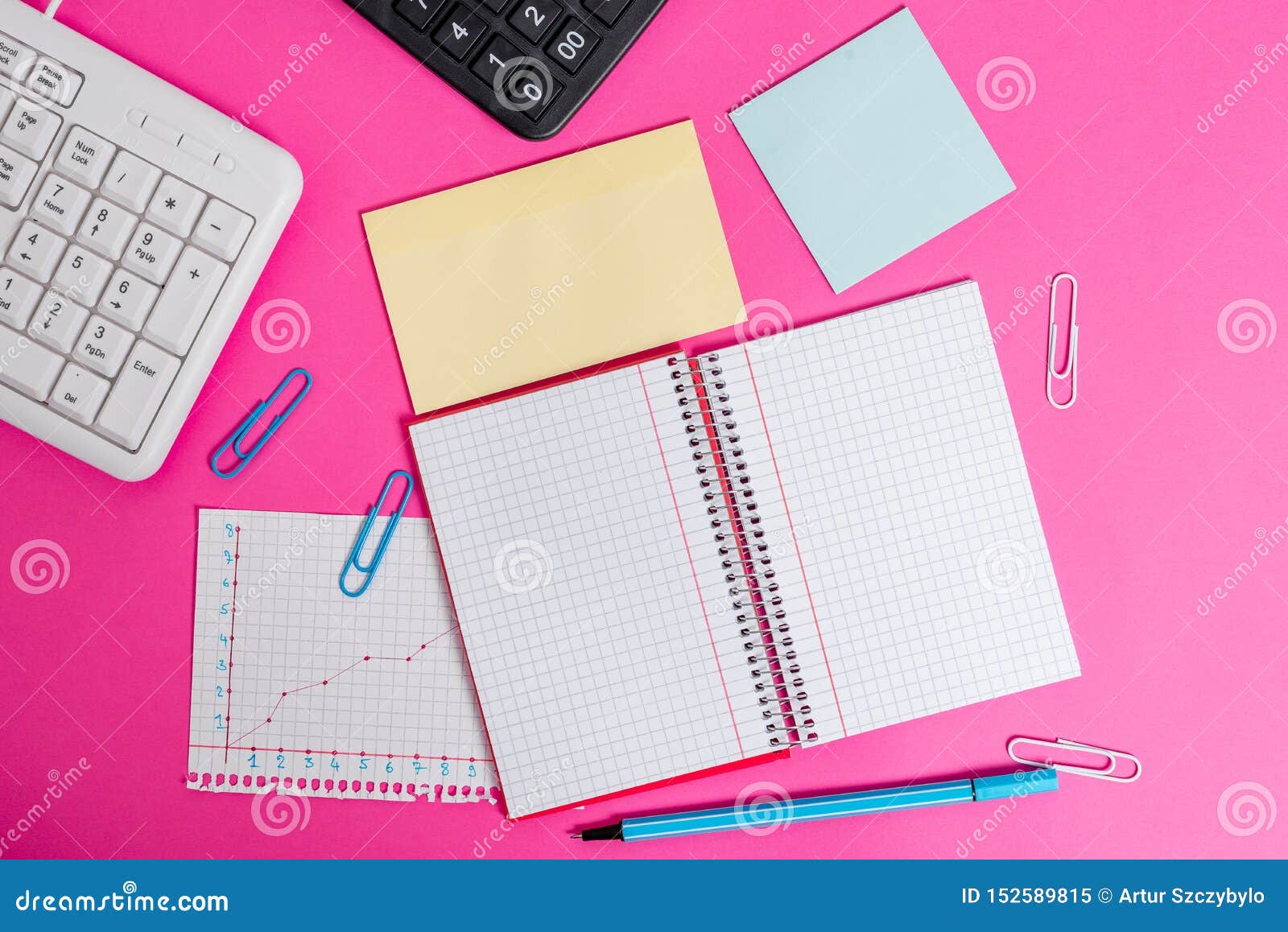 Writing Equipments and Computer Stuffs Plus Mathematic Paper Placed on ...