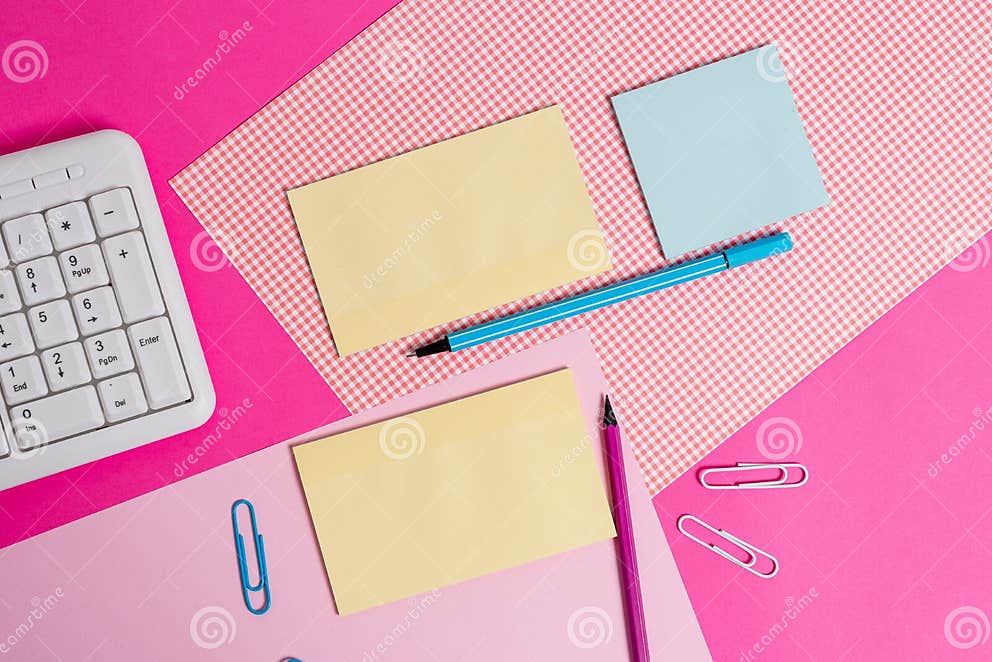 Writing Equipments and Computer Stuffs Plus Notation Paper Placed on a ...