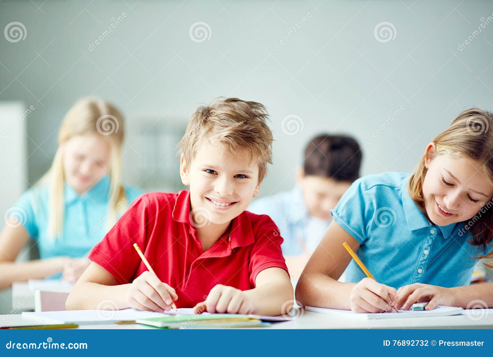 Writing at lesson stock photo. Image of school, schoolyear - 76892732