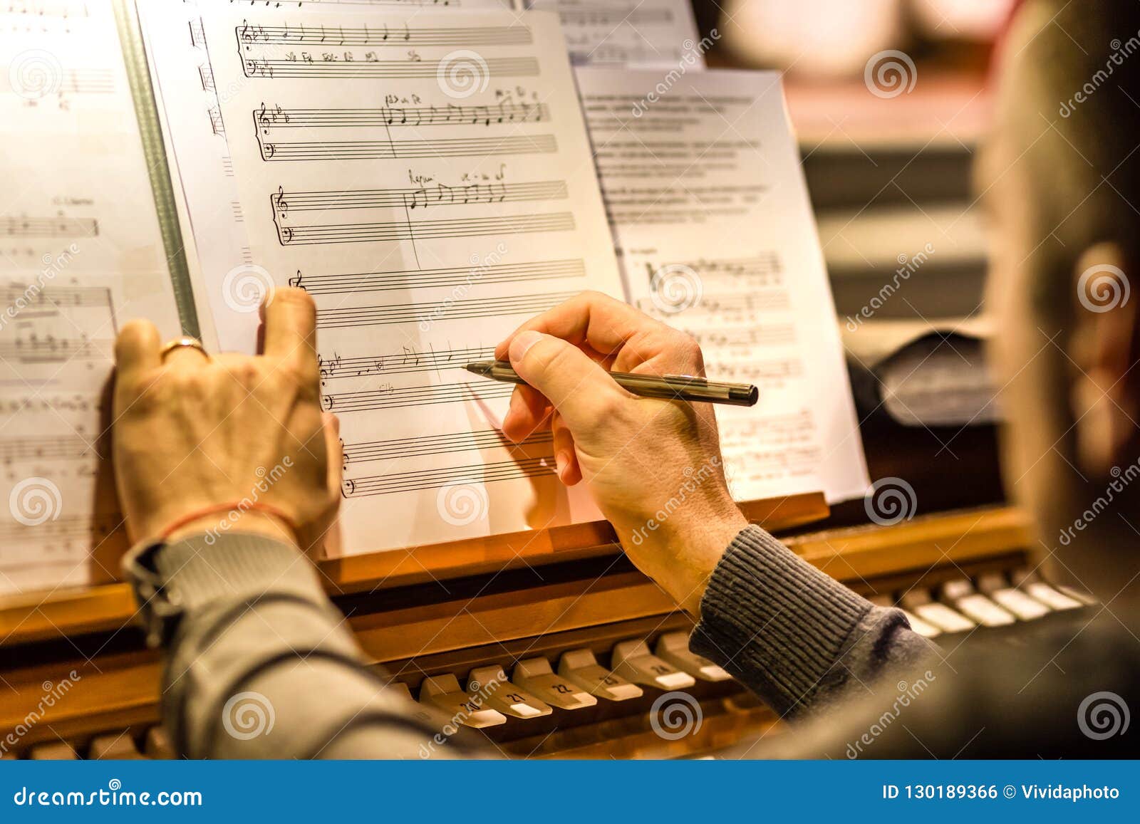 Writing on music sheet stock photo. Image of closeup - 130189366