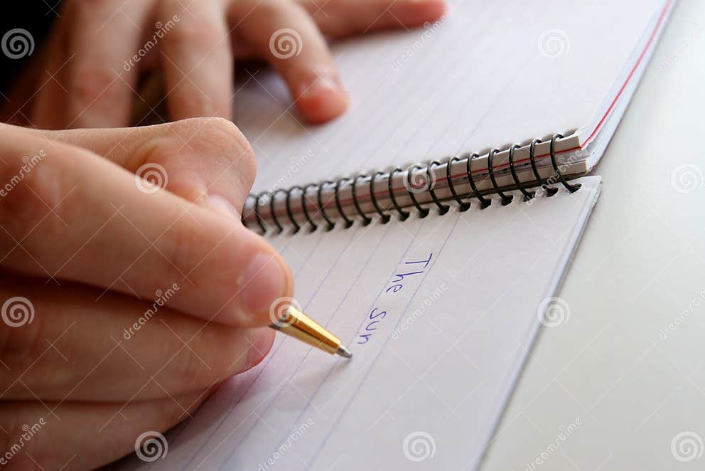 Writing in the notebook. stock photo. Image of holding - 1087918