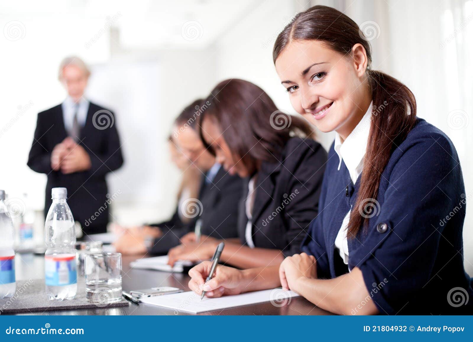 Writing Notes during a Business Training Stock Photo - Image of young ...