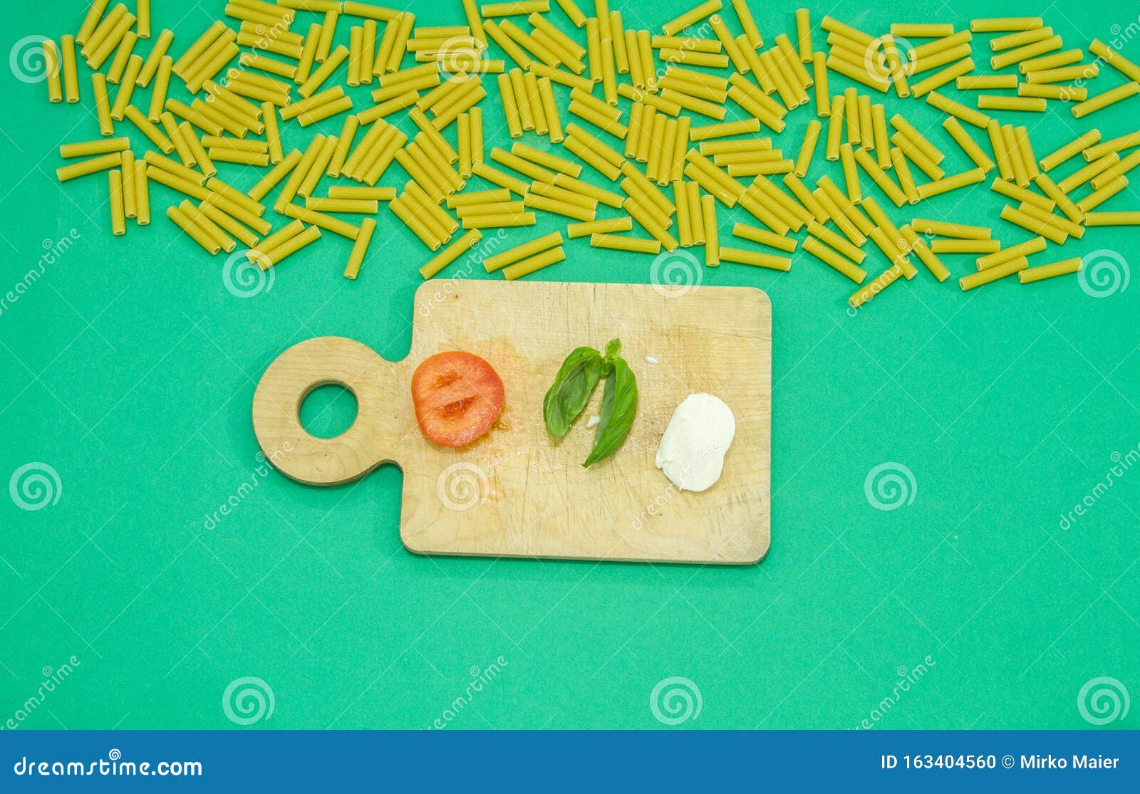Writing Pasta on a Green Background with the Macaroni Type Pasta with ...