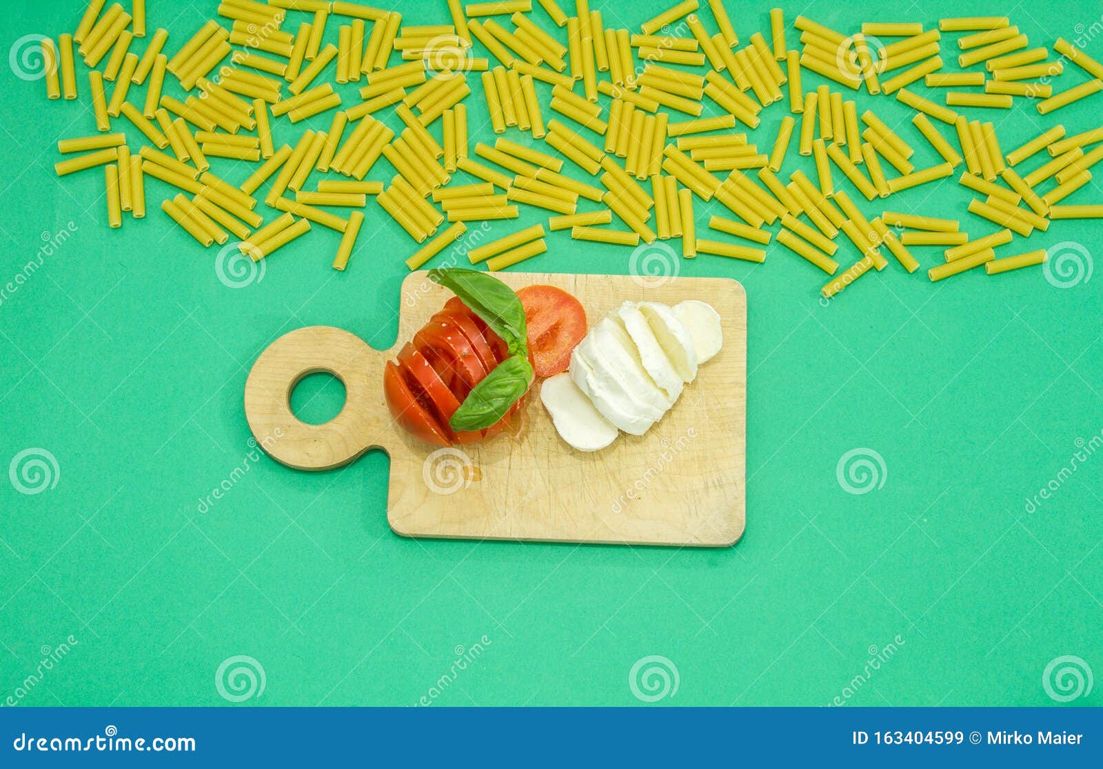 Writing Pasta on a Green Background with the Macaroni Type Pasta with ...