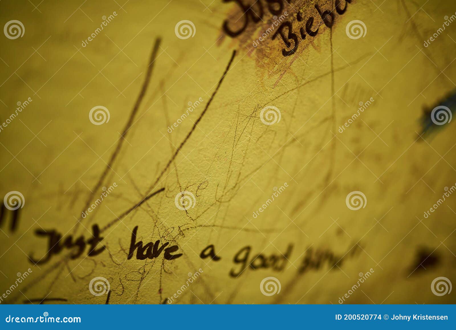 Writing of a Pop-star Name on a Yellow Wall Stock Photo - Image of ...