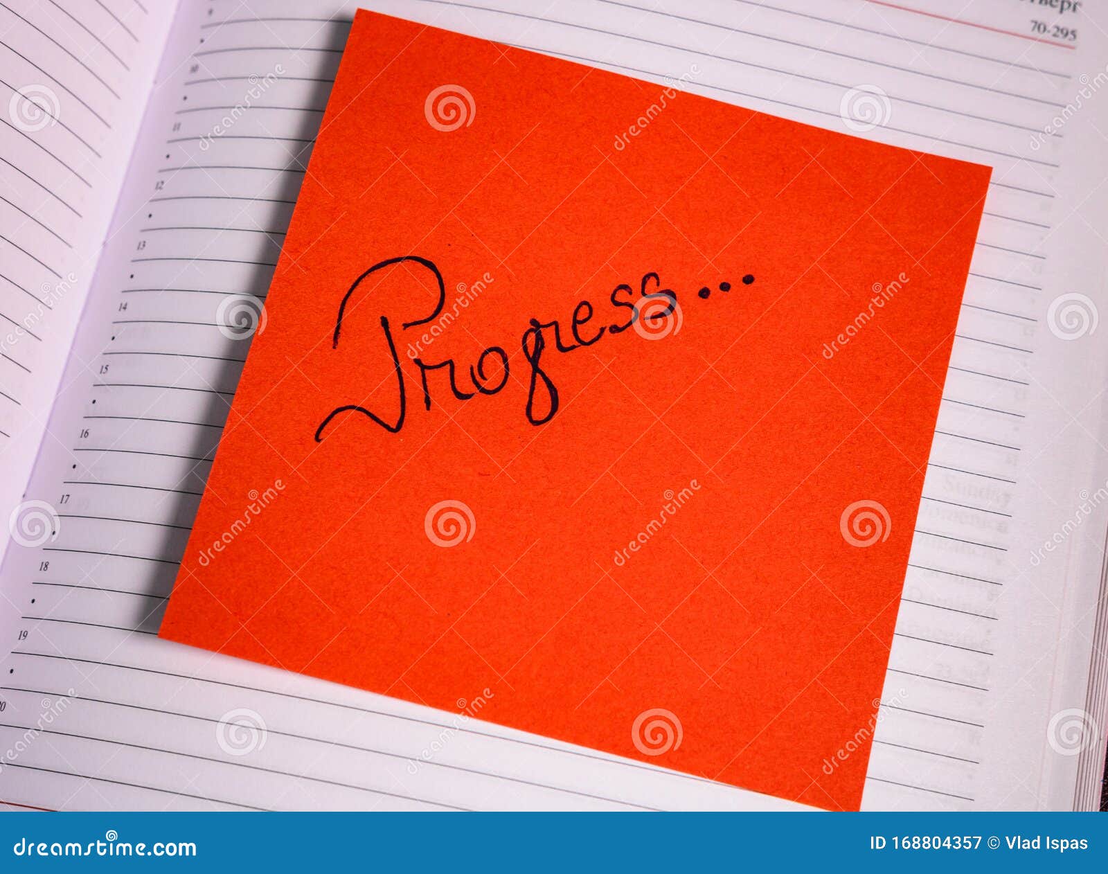 Writing Progress on Memo Post Reminder. Text on Sticky Paper Stock ...