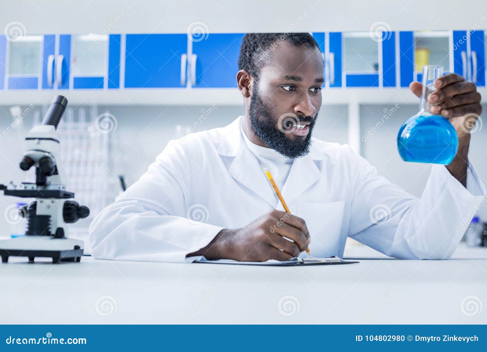 Serious Professional Chemist Taking Notes Stock Photo - Image of ...