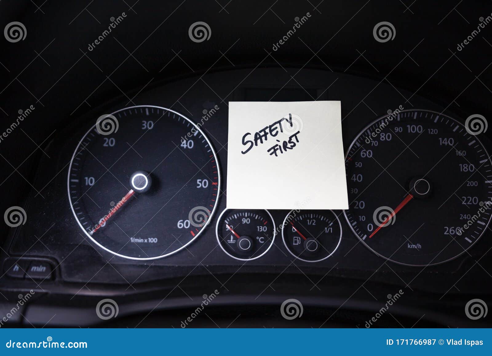 Writing Safety First on Memo Post Reminder. Text on Sticky Paper Inside ...