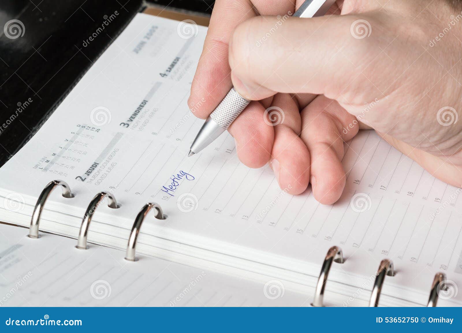 Writing with Silver Pen on Open Business Agenda Stock Photo - Image of ...
