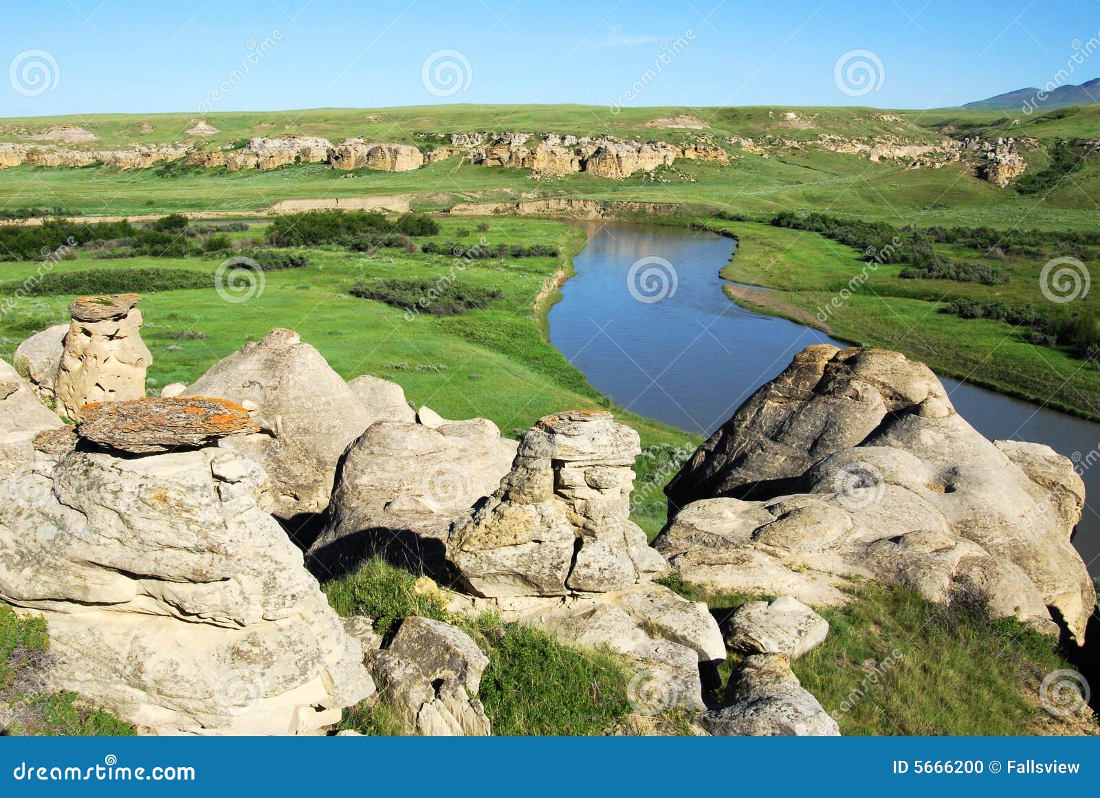 Writing on Stone Provincial Park Stock Photo - Image of cliffs, fields ...