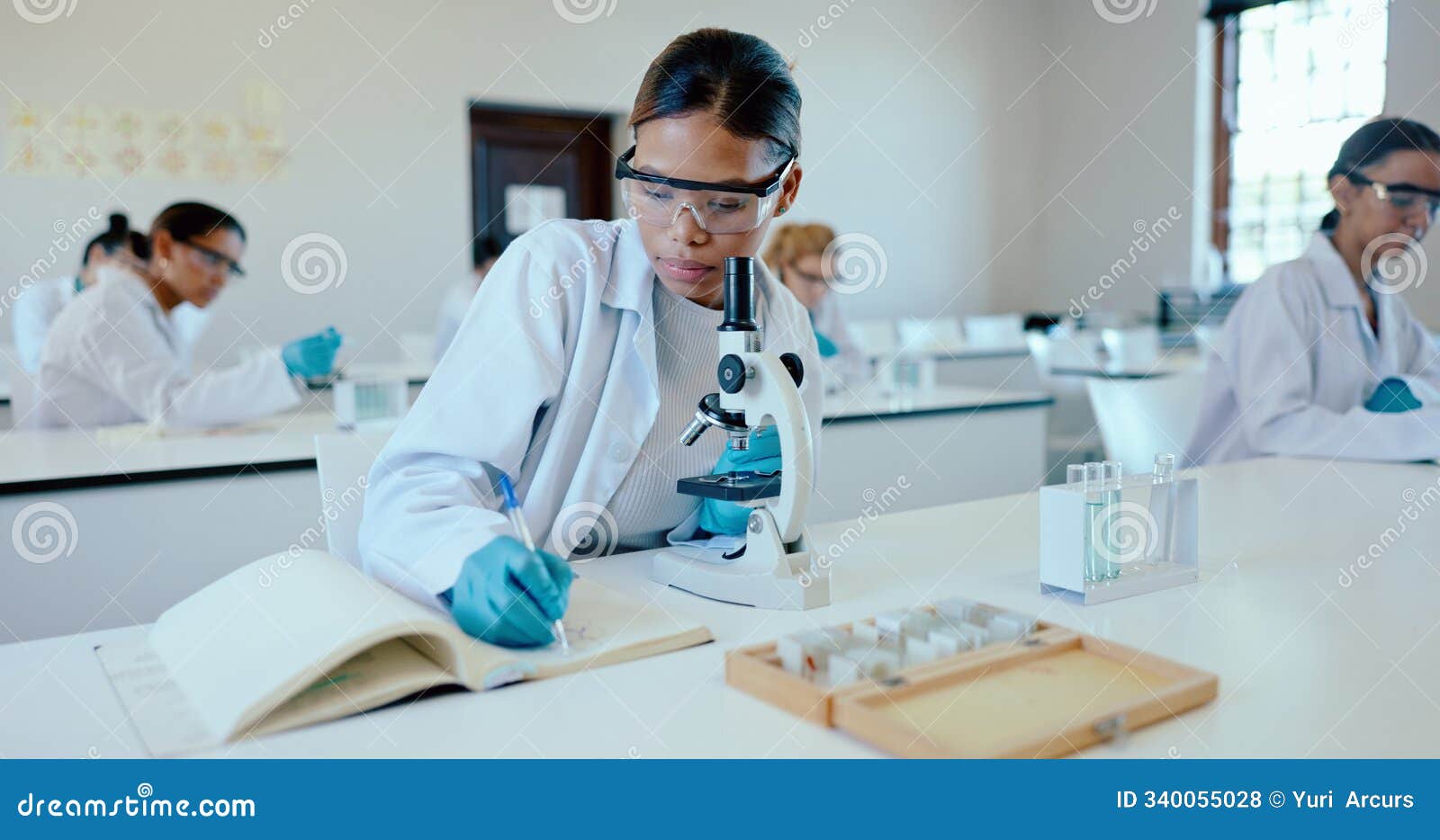 Writing, Student and Microscope in Science Classroom for Chemistry ...