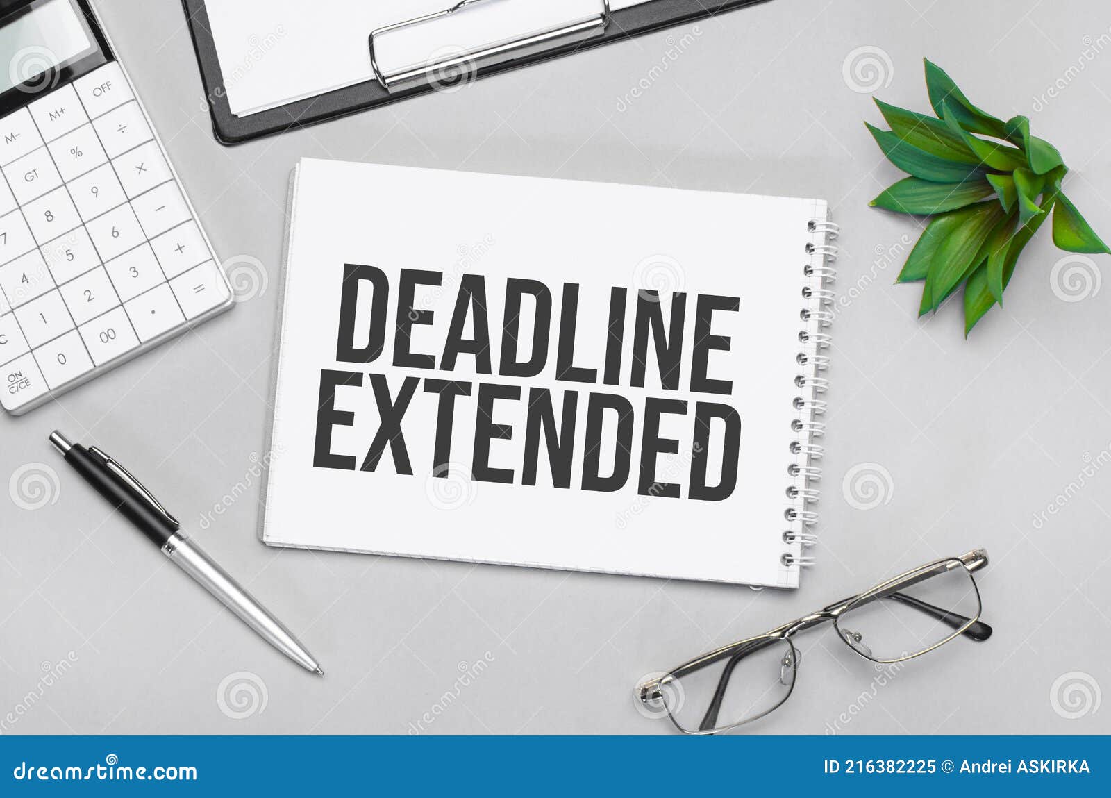 Writing Text Showing Deadline Extended. Calculator,pen,plan,glasses and ...